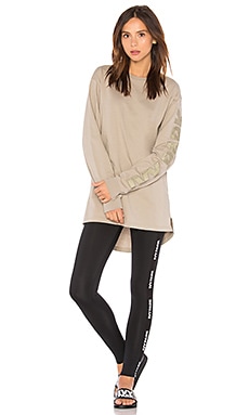 IVY PARK Long Sleeve Logo Top in Laurel Oak | REVOLVE