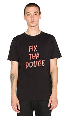 Lazy Oaf Fix The Police Tee in Black | REVOLVE