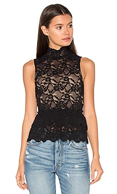 Nightcap Peplum Cut Out Top in Black | REVOLVE