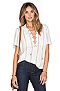 L'Academie The Safari Blouse in Stripe | REVOLVE