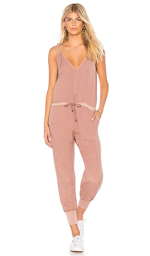YFB CLOTHING Ray Jumpsuit in Dusty Pink Oil Wash | REVOLVE