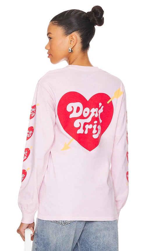 Women's Pink Graphic Tees: Oversized, Fitted & More | REVOLVE