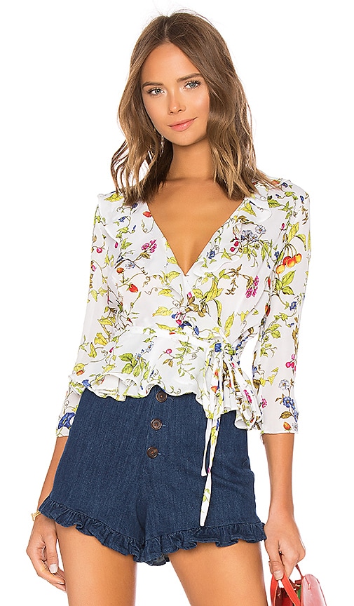 MILLY Ruffle Wrap Top in Multi | REVOLVE