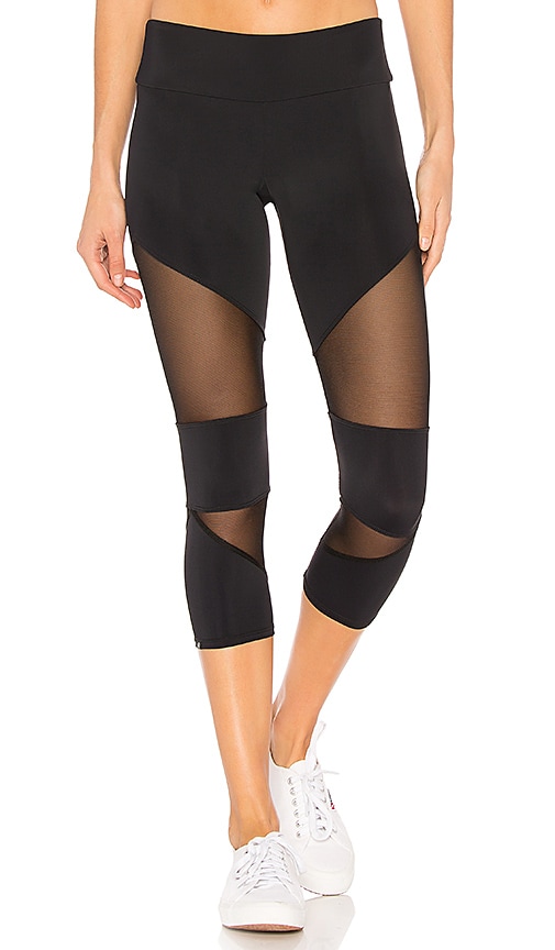 onzie Cut Out Capri in Black | REVOLVE