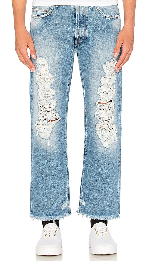 Palm Angels Ripped Denim in Vintage Wash | REVOLVE