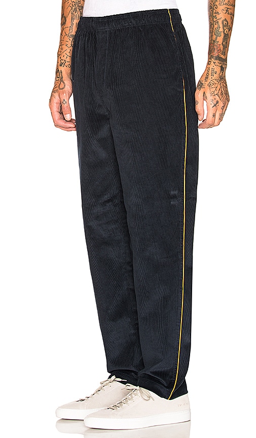 Stussy Side Piping Cord Pant in Navy | REVOLVE