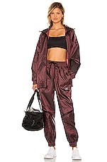 adidas by Stella McCartney ASMC Woven Track Pant in Hazros | REVOLVE