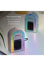 Crosley Radio Mini Jukebox Portable Bluetooth Speaker in Pink | REVOLVE