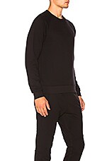 JOHN ELLIOTT Raglan Crew in Black | REVOLVE