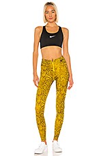 Nike Python Legging in Speed Yellow | REVOLVE