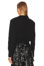 ROTATE SUÉTER CON LOGO en Black | REVOLVE