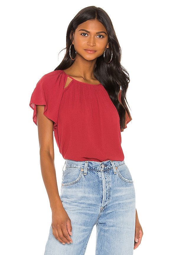 1. STATE Cut Out Detail Blouse in Mineral Red | REVOLVE