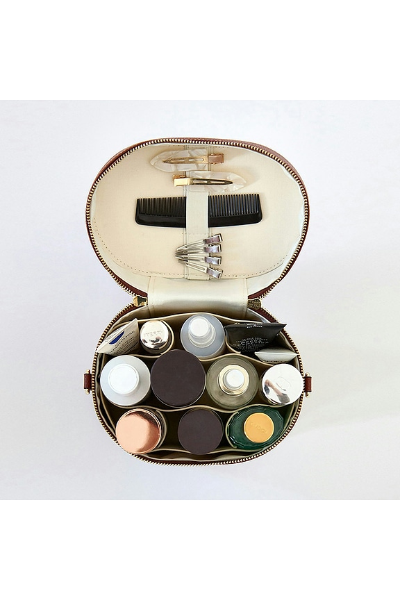 ETOILE COLLECTIVE Oval Toiletry Case in Espresso | REVOLVE