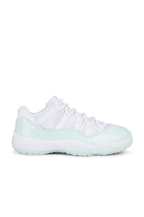 Jordan Air Jordan 11 Retro Low Sneaker in White & Igloo | REVOLVE