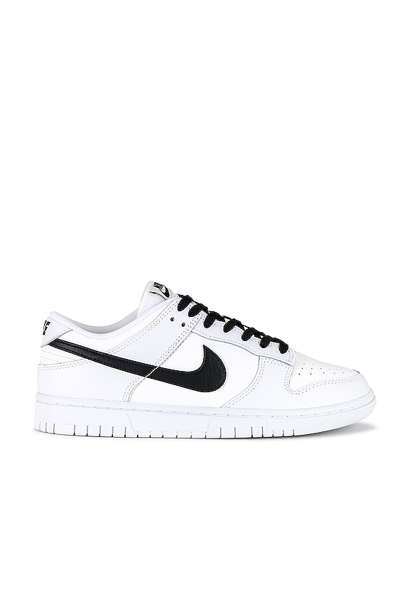 Nike Dunk Low Retro Sneaker in White, Black Summit, & White | REVOLVE