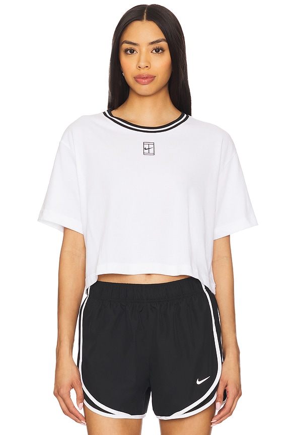 Nike Dri-FIT Short Sleeve Cropped T-shirt in White | REVOLVE