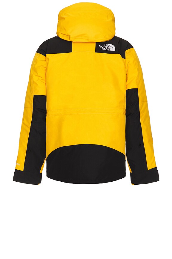 The North Face S Gtx Mountain Guide Insulated Jacket in Summit Gold & Tnf Black | REVOLVE