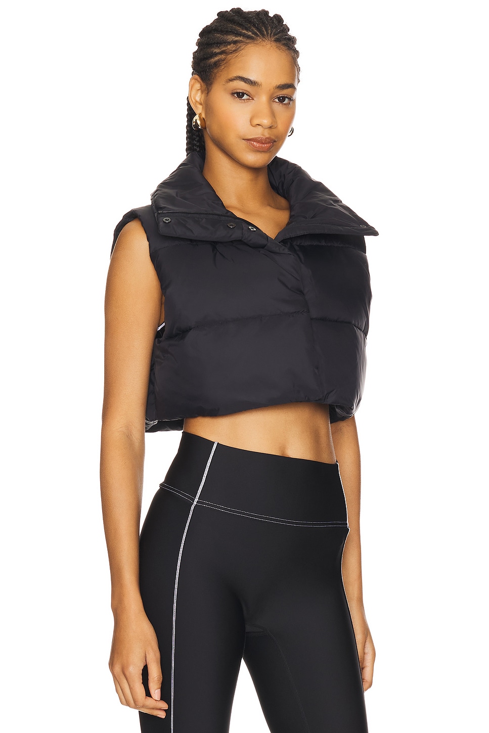 alo Extreme Cropped Gold Rush Puffer Vest in Black | REVOLVE