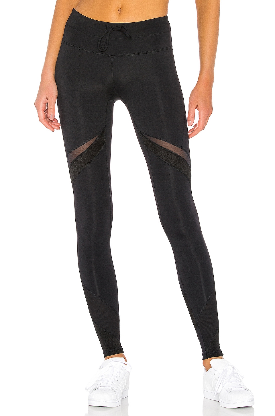 Free People X FP Movement Mid Rise Tap Back Legging in Black | REVOLVE