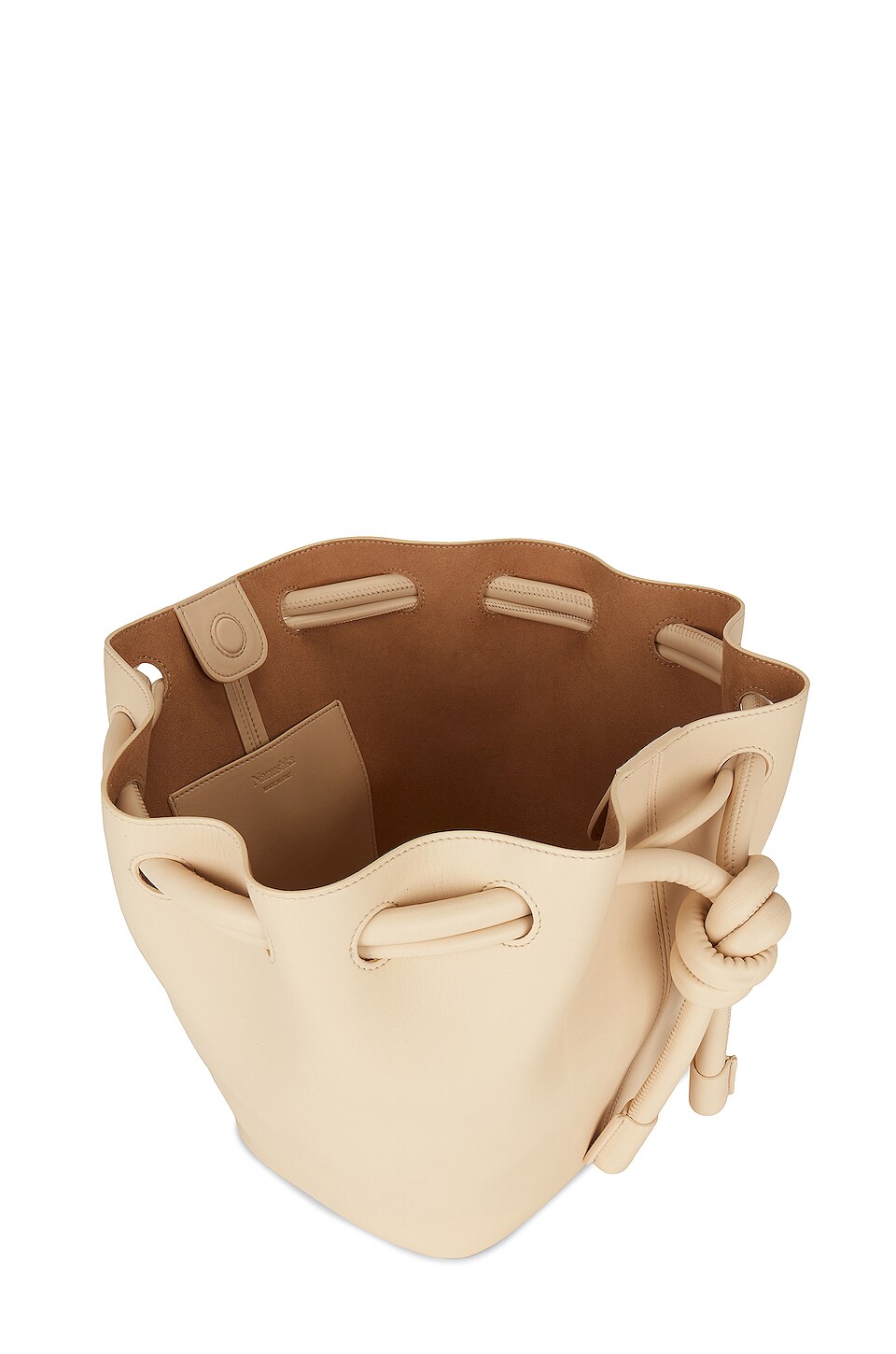 Nanushka Small Elongated Bucket Bag in Ivory | REVOLVE