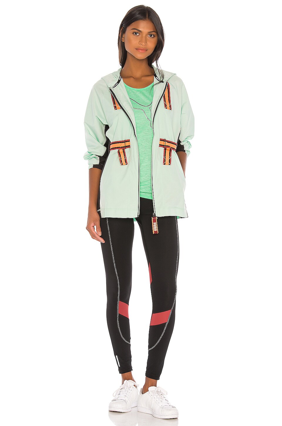 Puma The First Mile Eclipse Tight in Puma Black & Burnt Russet | REVOLVE