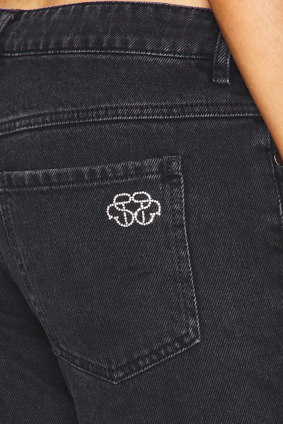 Santa Brands Flared Jeans in Black | REVOLVE