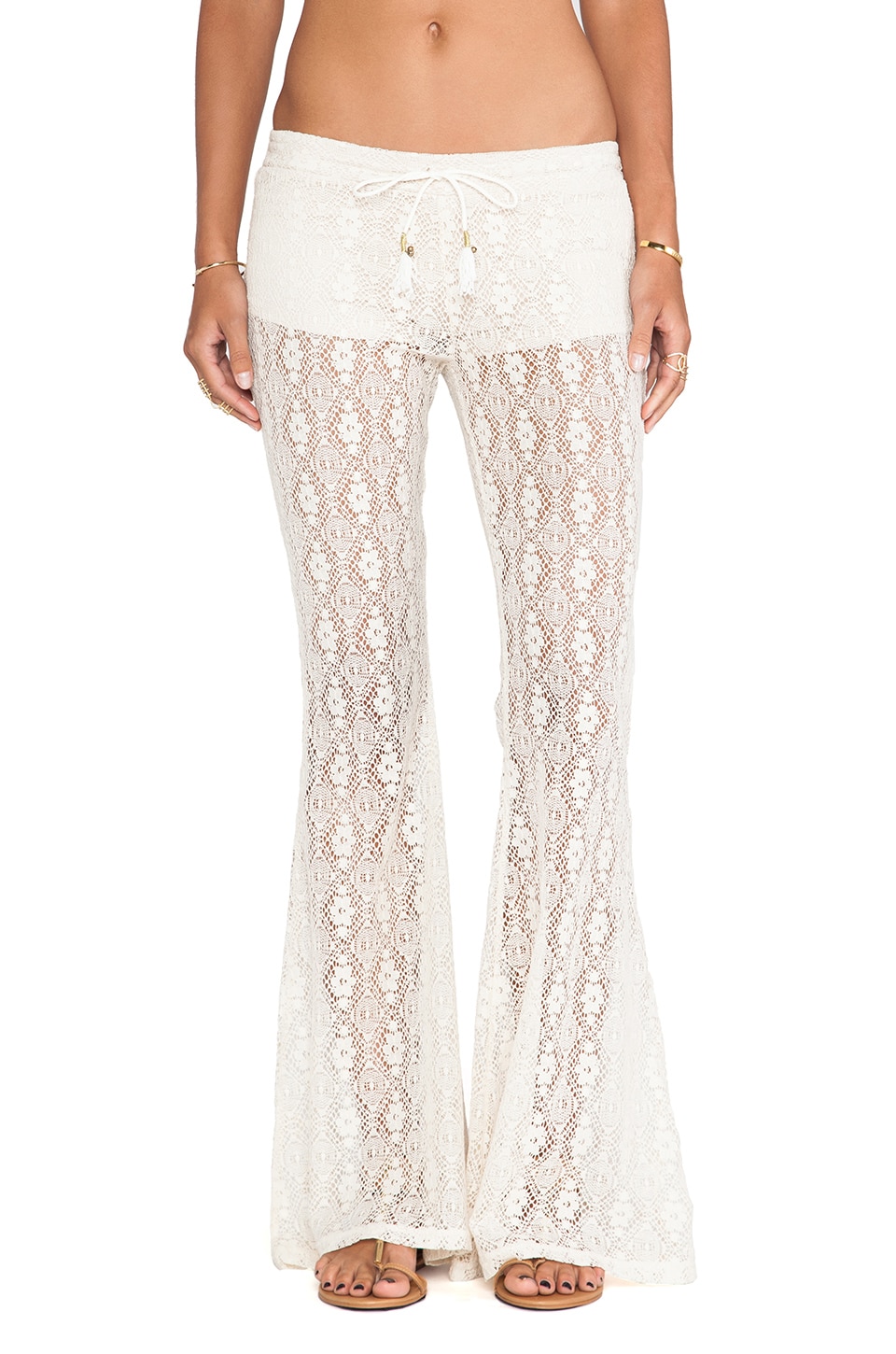 SPELL Phoenix Lace Flares in Cream | REVOLVE